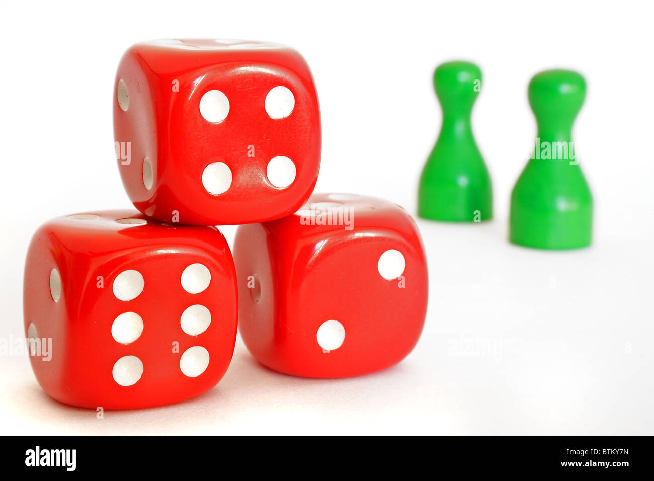 Red dices and green figures. All isolated on white background Stock ...