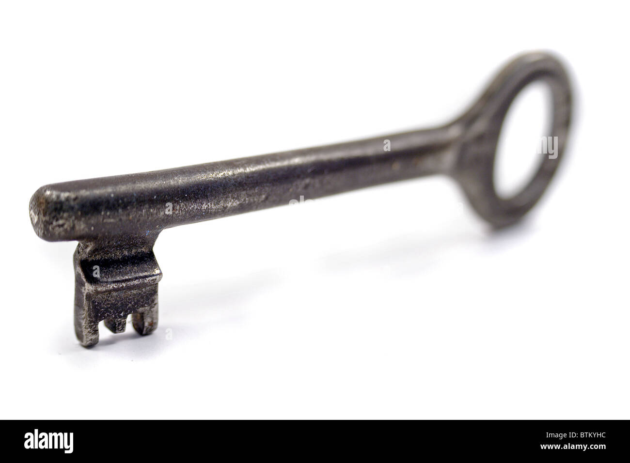 A close up of an old-fashioned metal key Stock Photo - Alamy