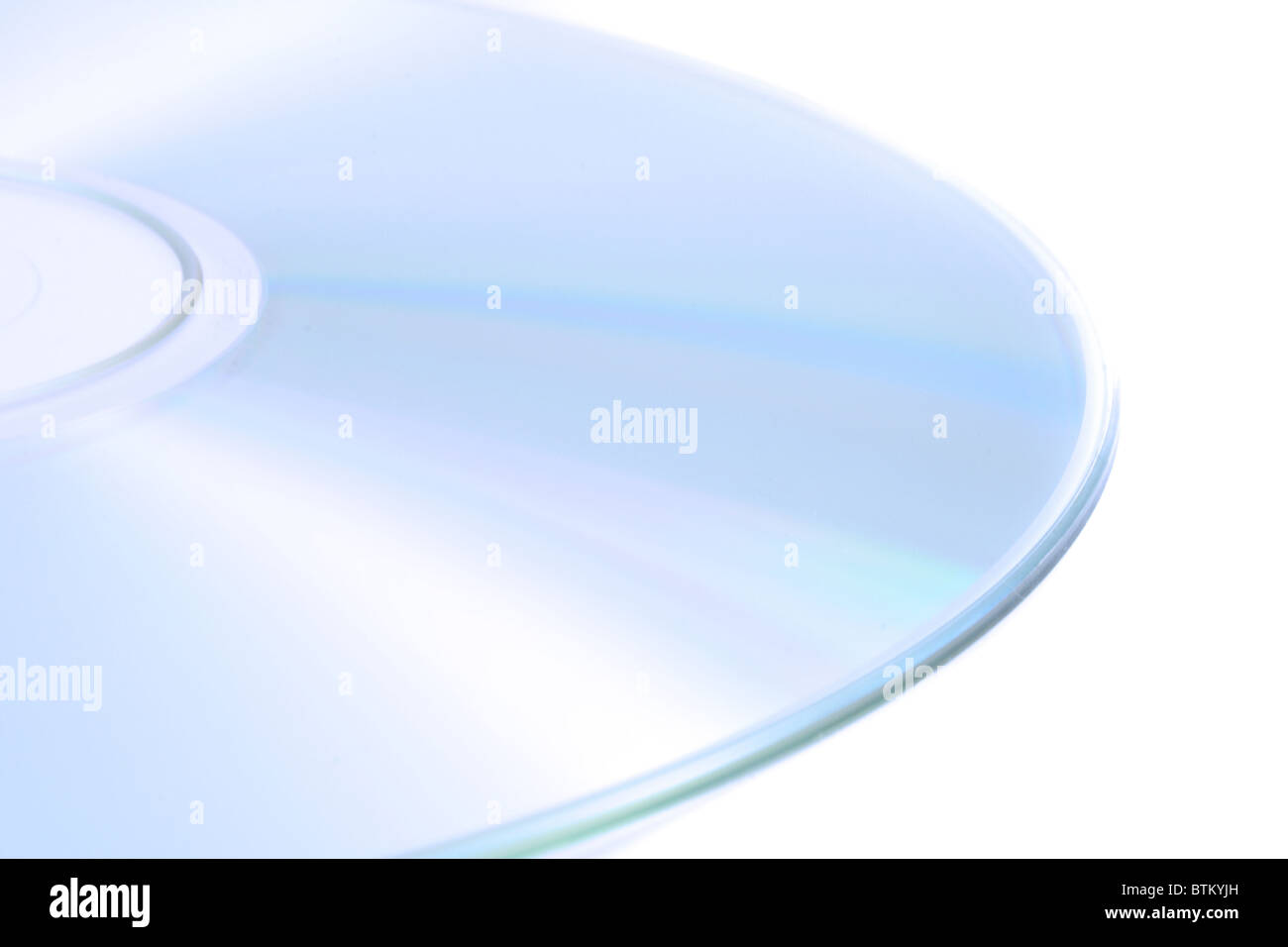 A closeup view of a light shiny compact disk used for data storage on a ...