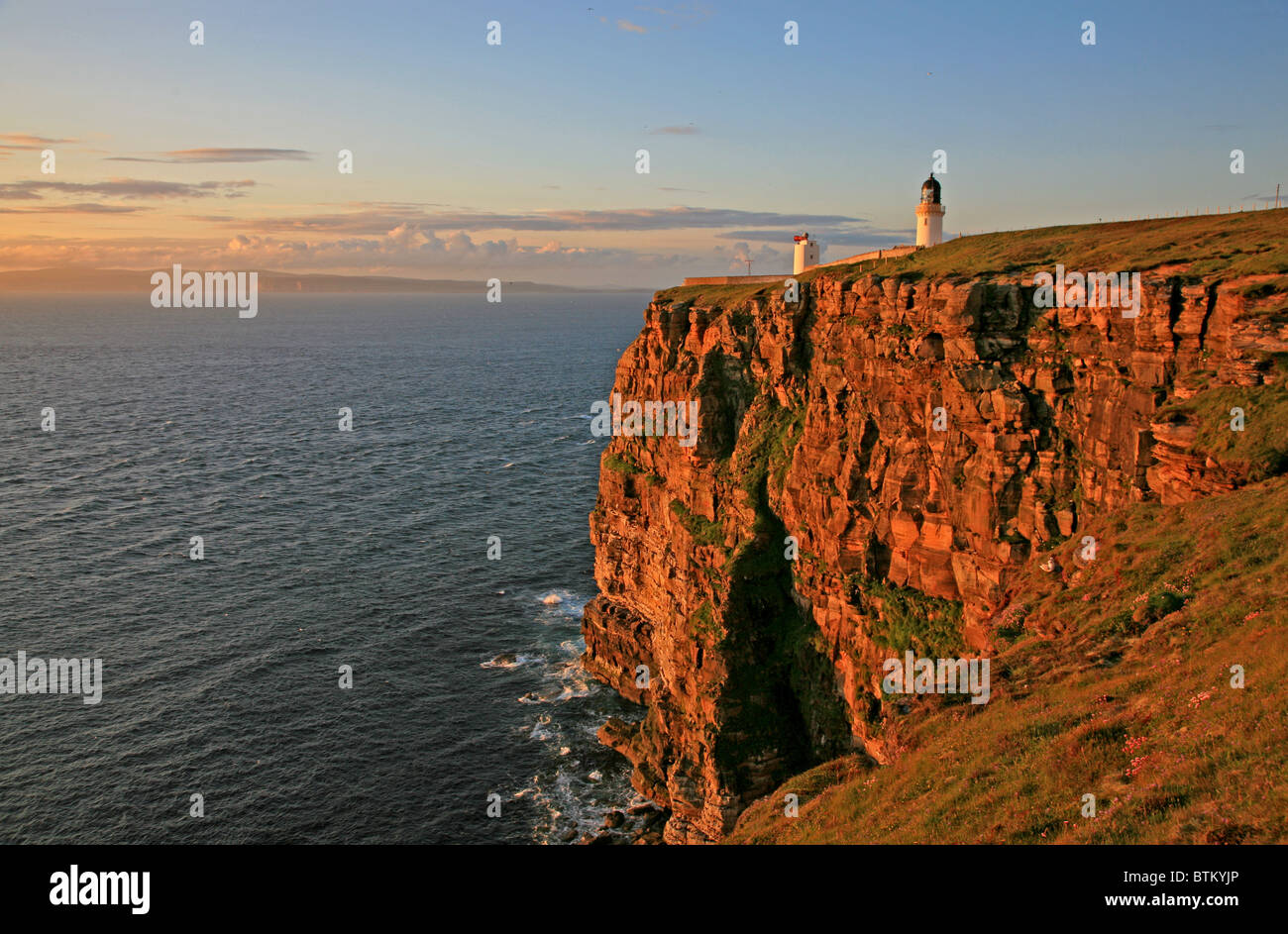 Evening light on the cliffs looking over the Pentland Firth to Orkney ...