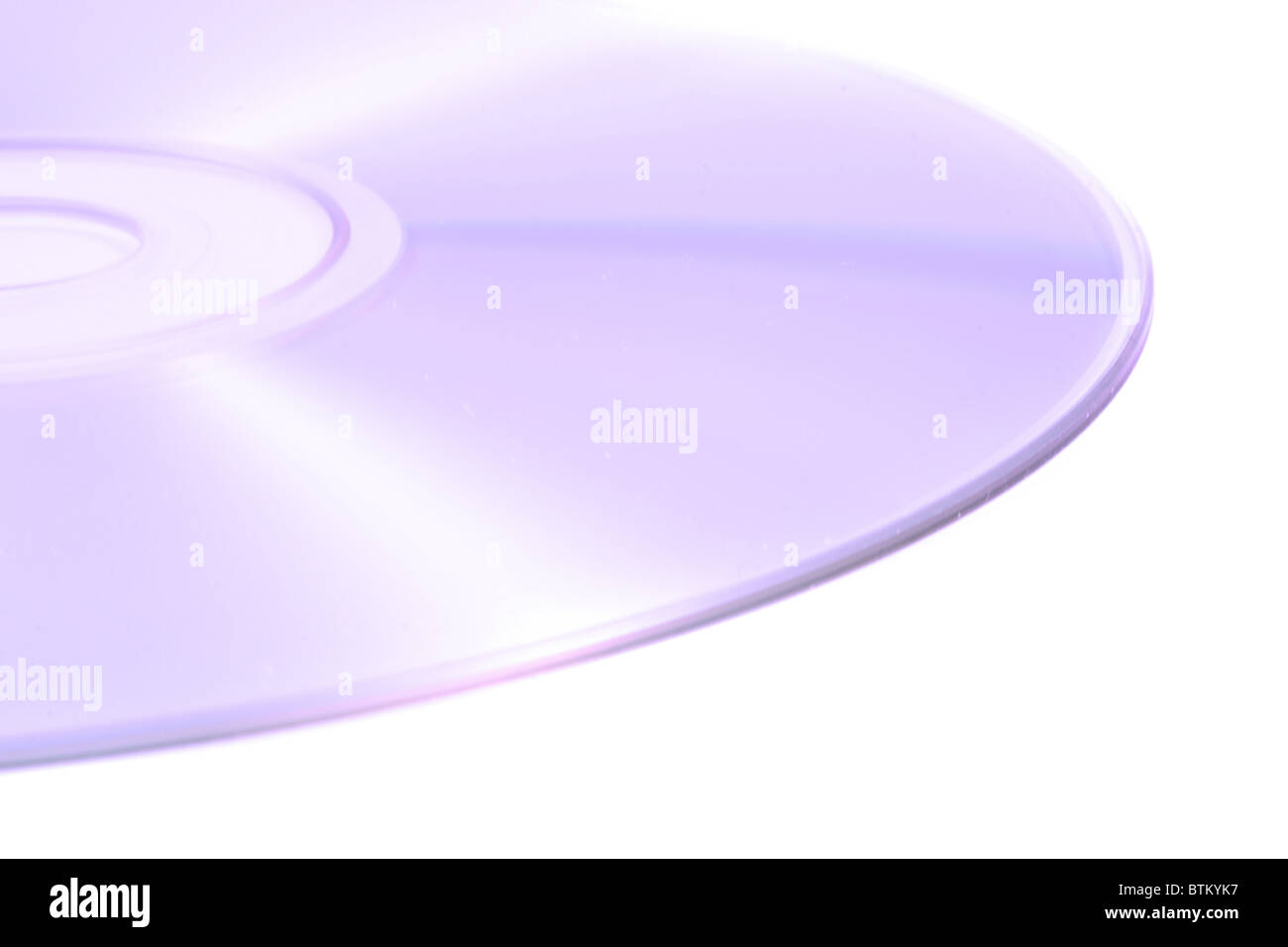 A closeup view of a light shiny compact disk used for data storage on a ...