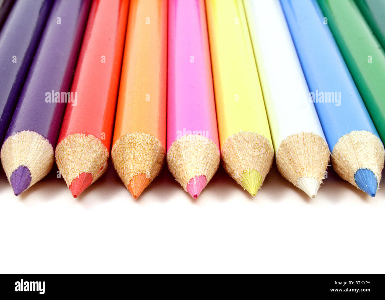 A line of colorful crayons. All isolated on white background Stock ...