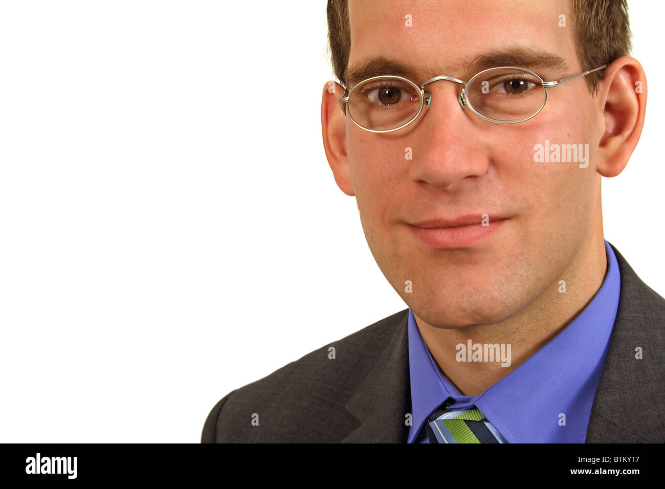 A young motivated business man in front of white background Stock Photo ...