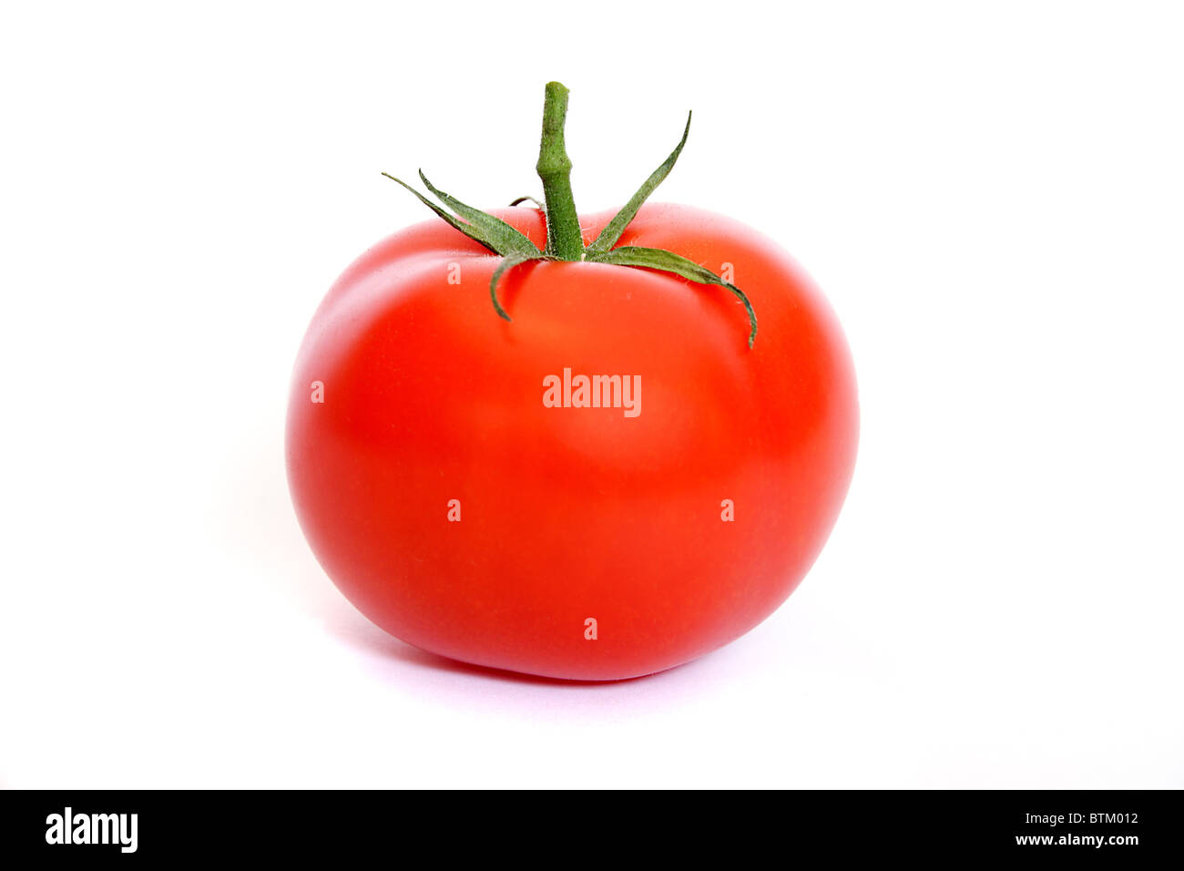 A single red tomato. All isolated on white background Stock Photo - Alamy