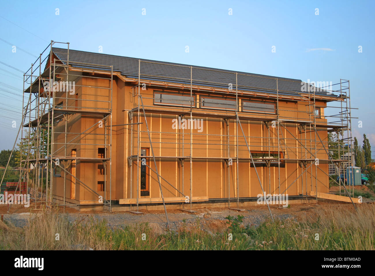 A typical building site during a bright sunset Stock Photo - Alamy