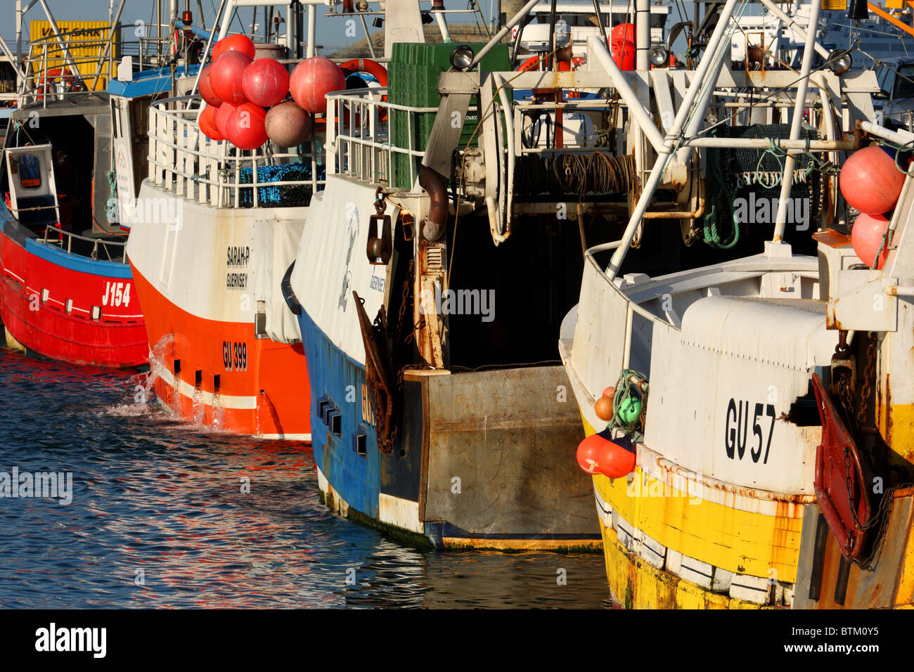 Fishing boats moared to the fishermans quay in St Peter Port, Guernsey ...