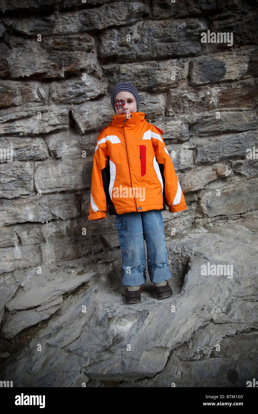 boy posing at wall Stock Photo - Alamy