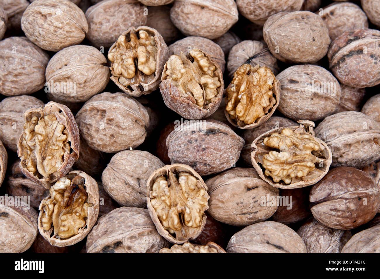 Brown raw walnuts Stock Photo - Alamy