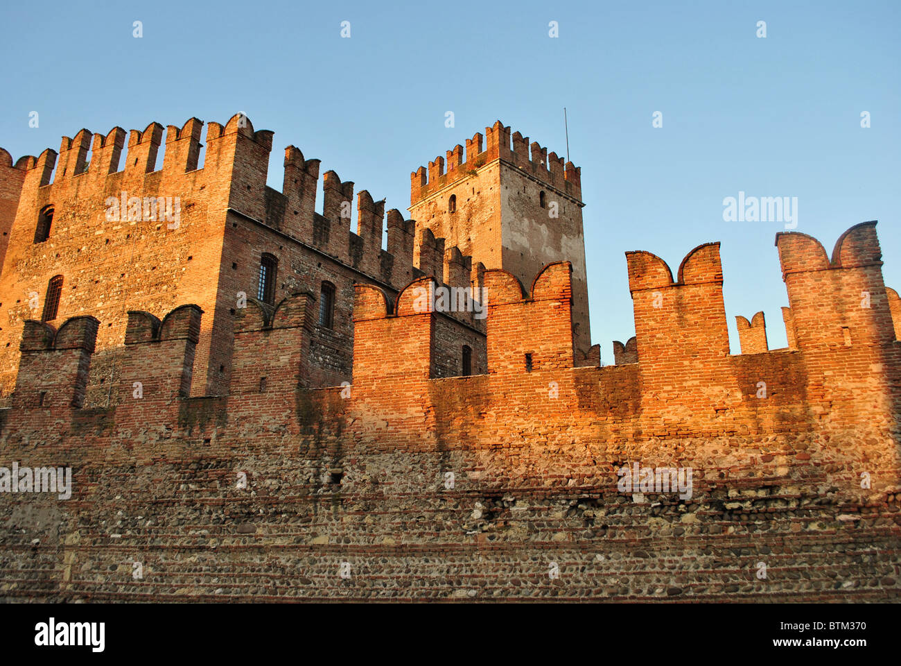 medieval castle with red brick fortifications Stock Photo - Alamy
