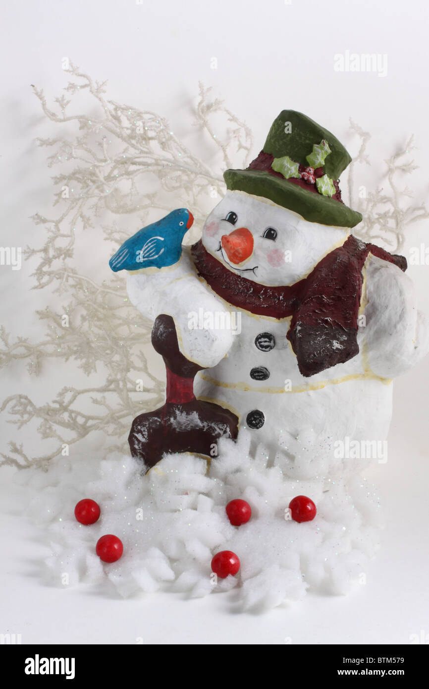 Snowman with shovel hi-res stock photography and images - Alamy