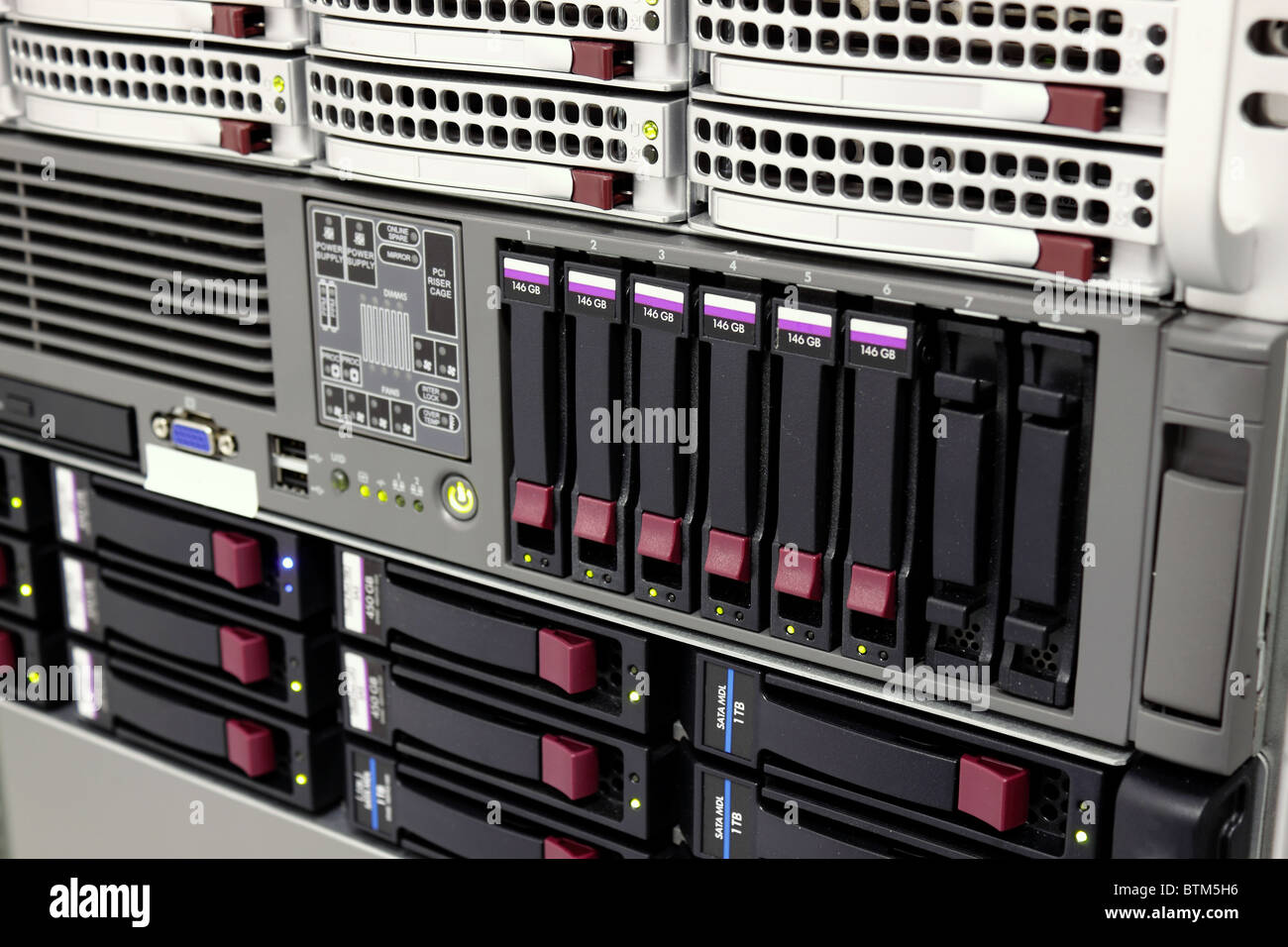 servers stack with hard drives in a datacenter for backup and data ...