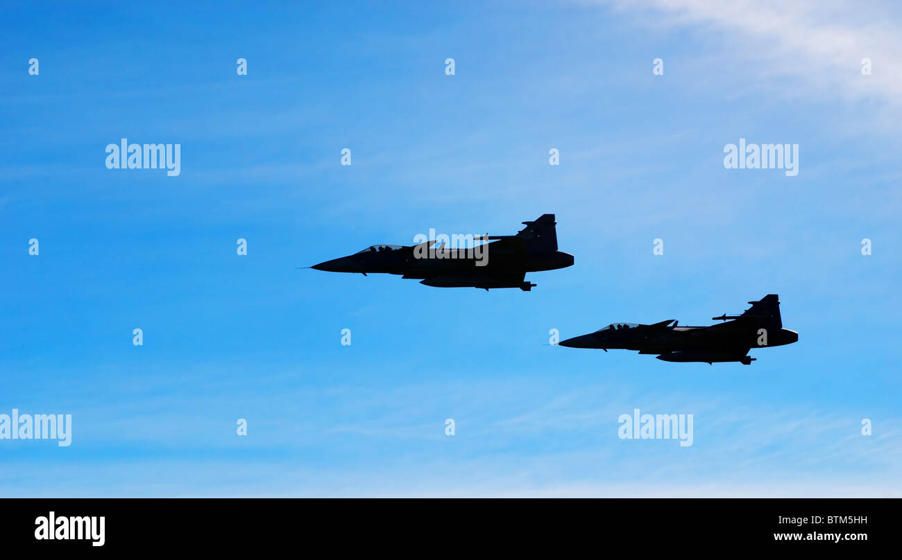 Two aircraft Jas 39 Gripen on blue sky Stock Photo - Alamy