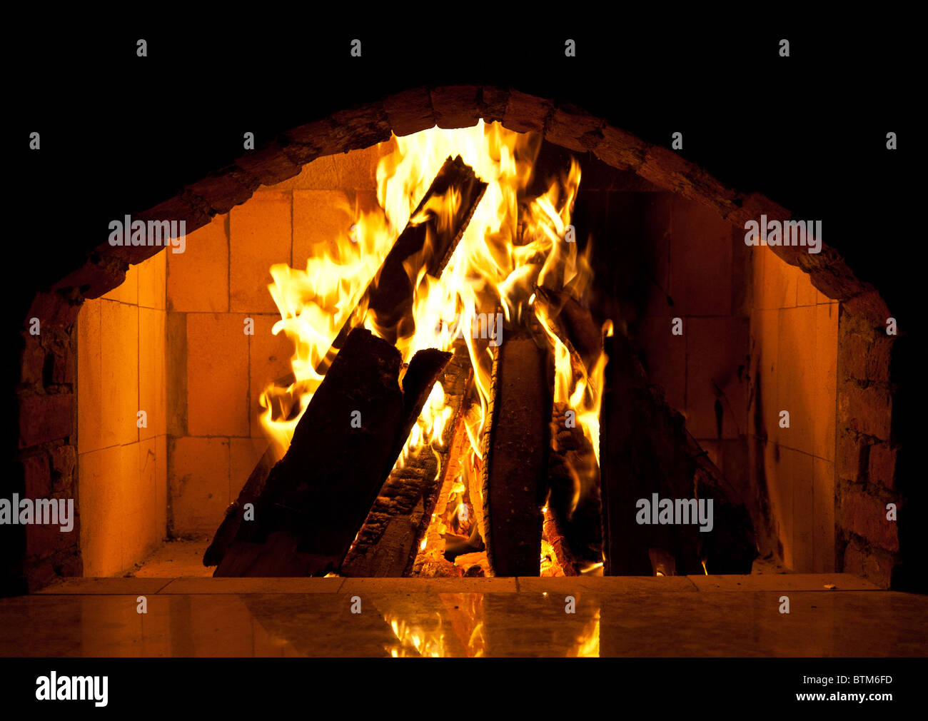 Fire in a fireplace Stock Photo - Alamy