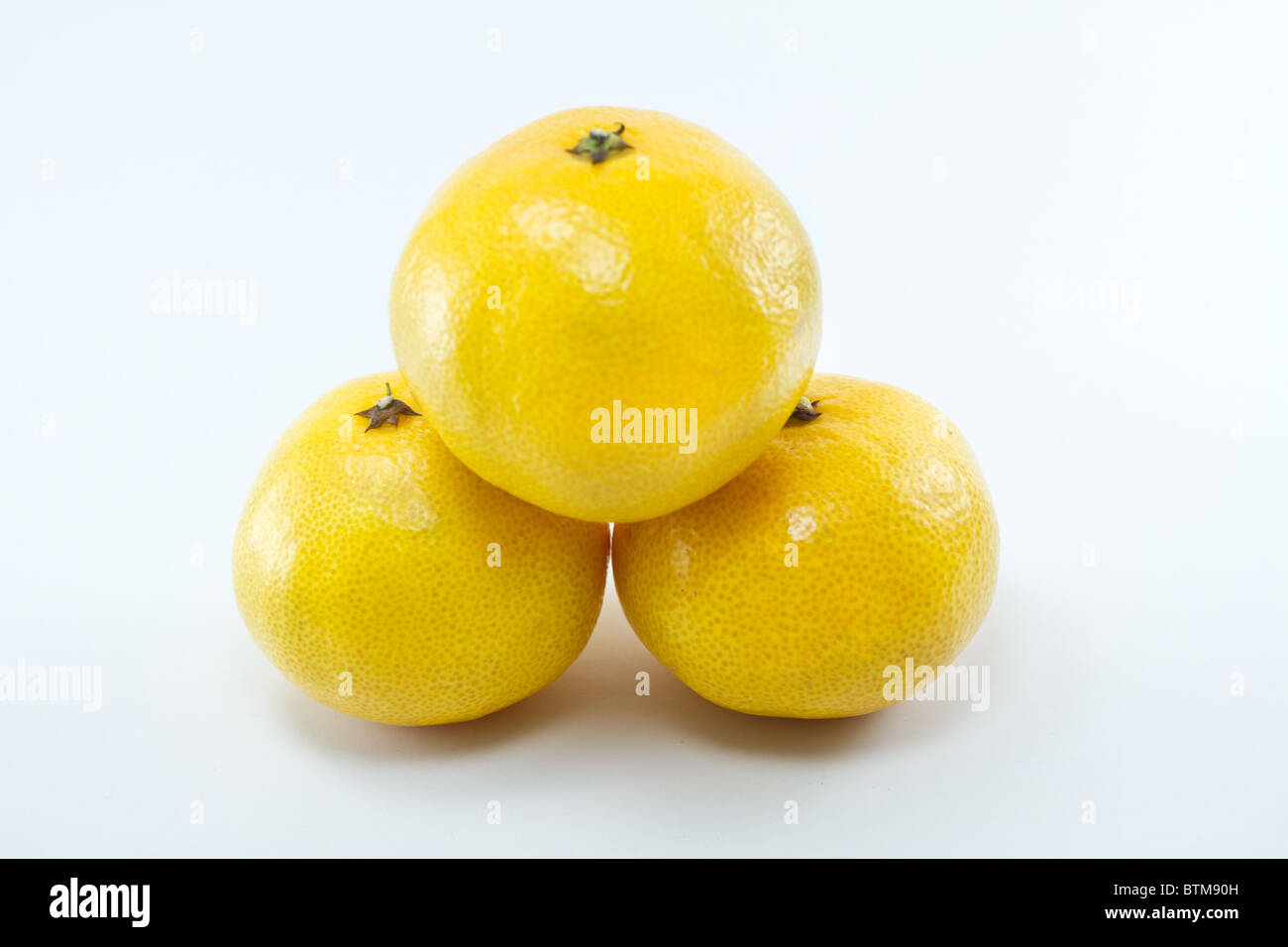 Close up mandarin on white Cut Out Stock Images & Pictures - Alamy