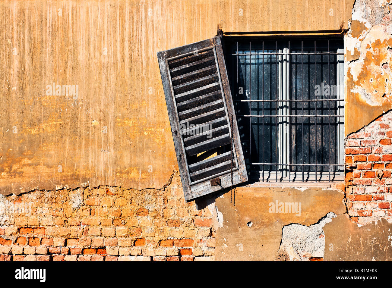 Close-up shuttered window on a derelict building Stock Photo - Alamy