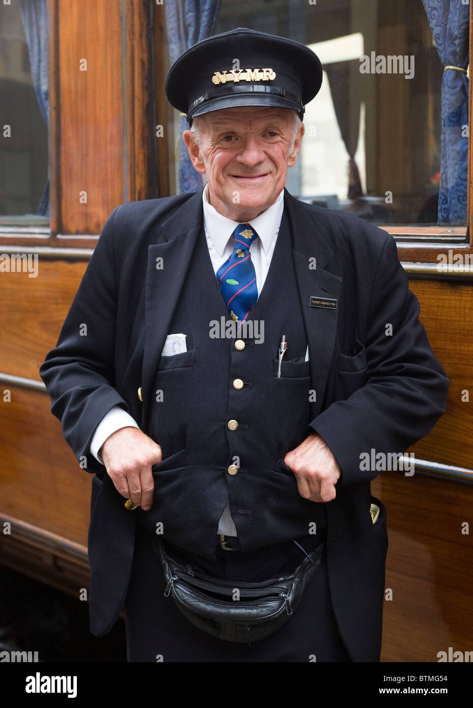 Old fashioned train conductor hi-res stock photography and images - Alamy