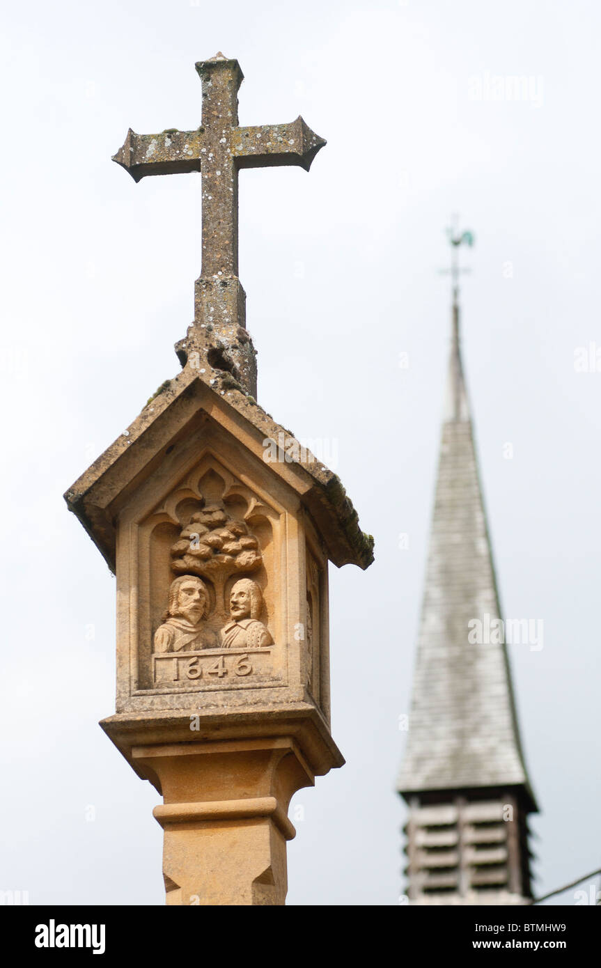 The Market Square Cross with St Edward's hall spire in background, Stow ...
