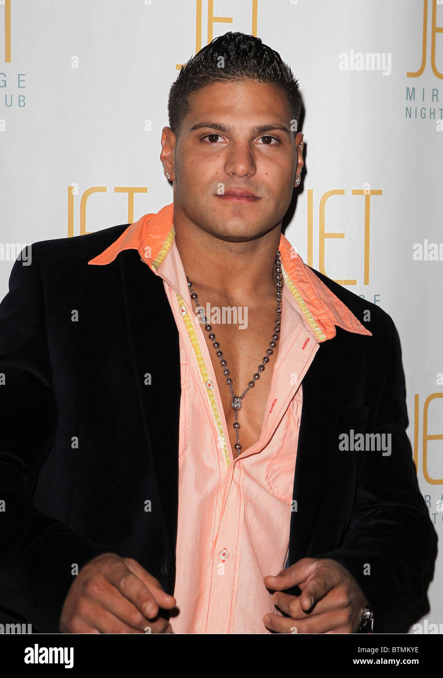 Half unbuttoned shirt hi-res stock photography and images - Alamy