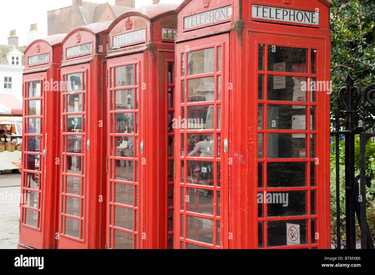 4 Four Red Telephone Boxes Cambridge Market Square Stock Photo - Alamy