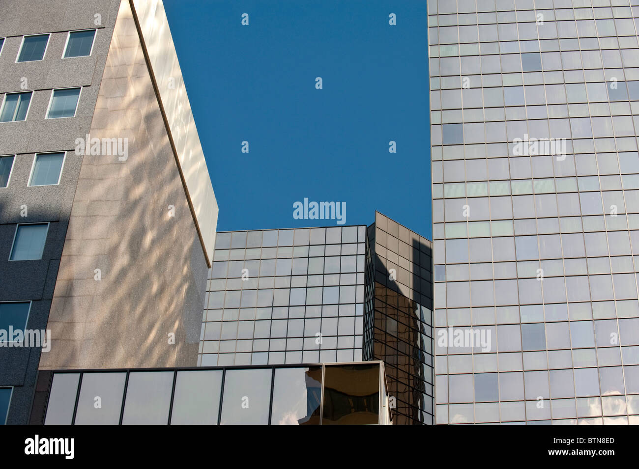 Downtown buildings shot from low angle looking up Stock Photo - Alamy