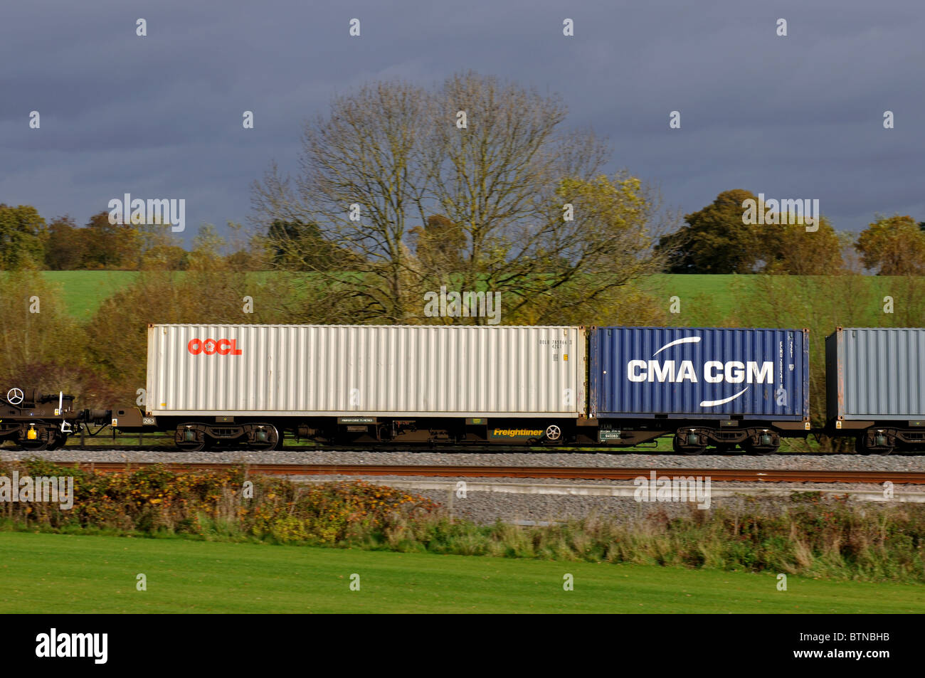 Goods train carrying freight containers hi-res stock photography and ...