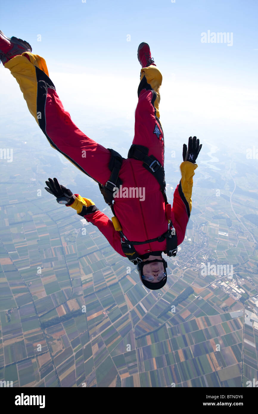 Girl is training head down flight position in freefall with 130 MPH ...