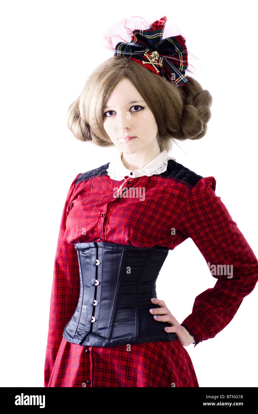 A young goth woman wearing a chequered victorian style dress Stock ...