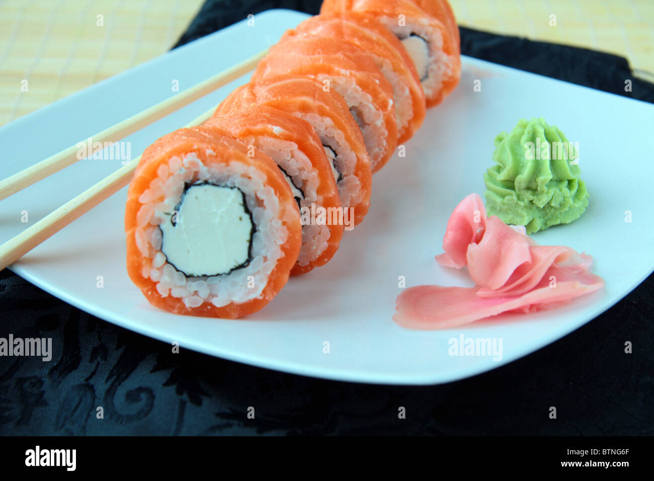 Traditional Japanese food on a square plate Stock Photo - Alamy