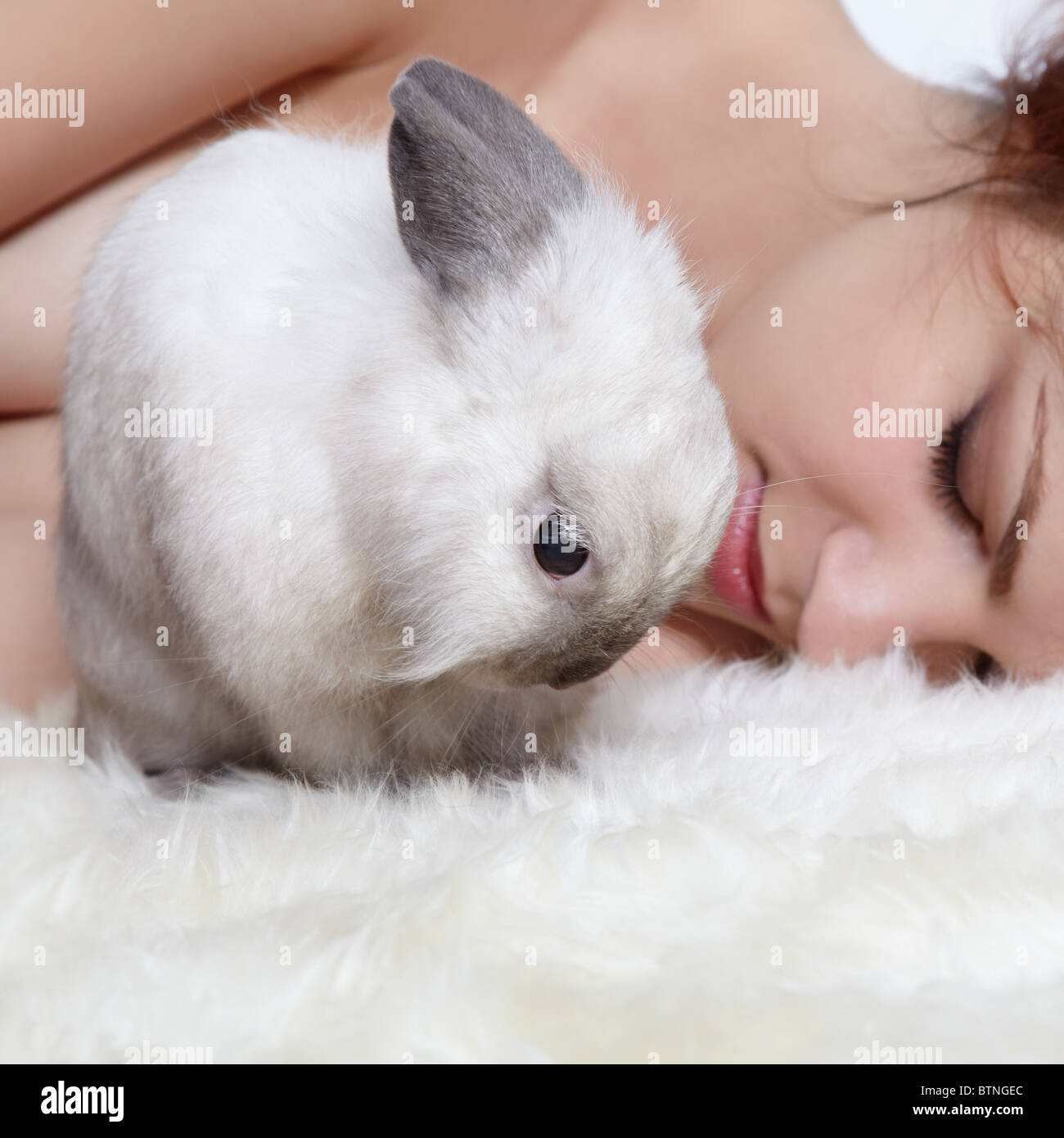 Girl sleeping with his pet pygmy rabbit Stock Photo - Alamy