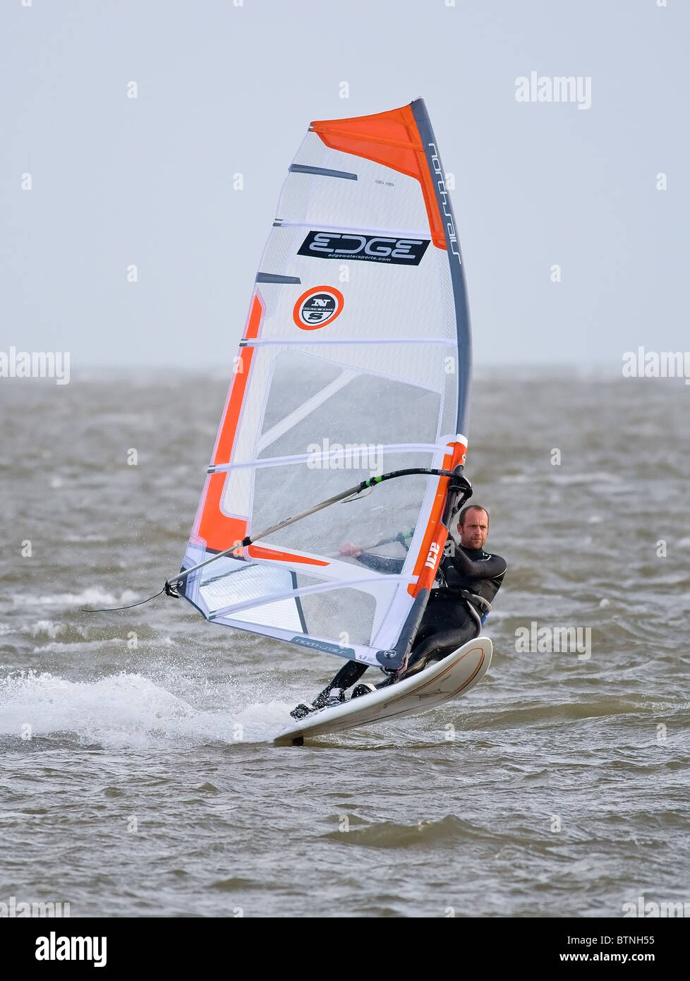 Windsurfing at Exmouth, Devon, UK Stock Photo - Alamy