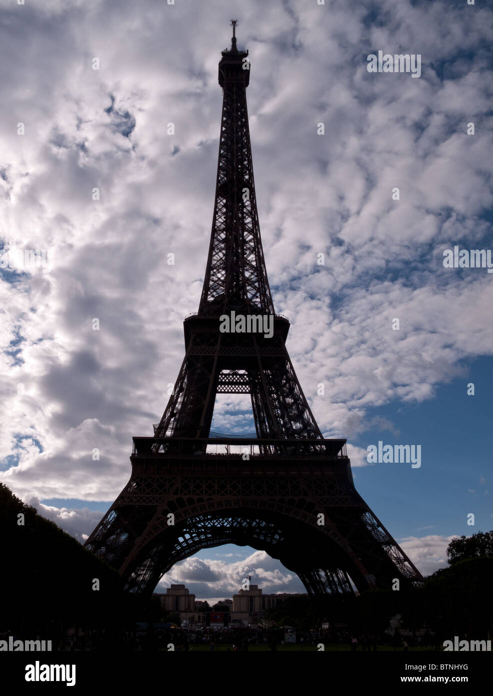 Shape of Eiffel Tower against a blue cloudscape in Paris Stock Photo ...