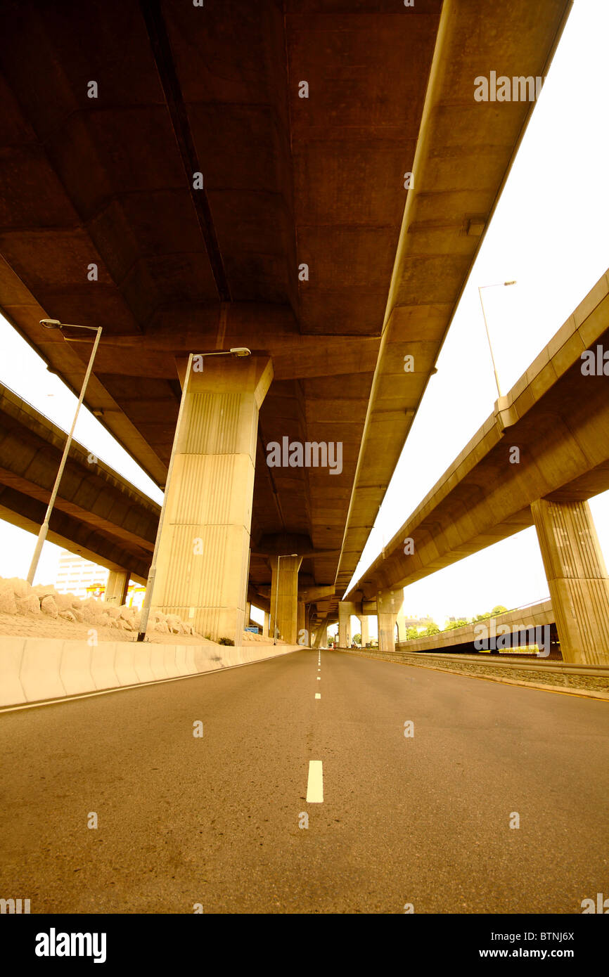 highway under the bridge with yellow toned Stock Photo - Alamy