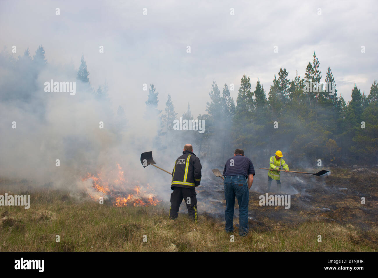 Firefighters battling a forest fire in Mayo, Ireland Stock Photo - Alamy