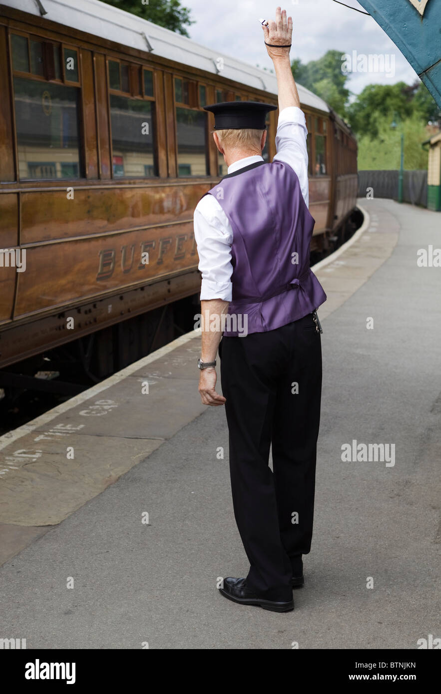 Old fashioned train conductor hi-res stock photography and images - Alamy