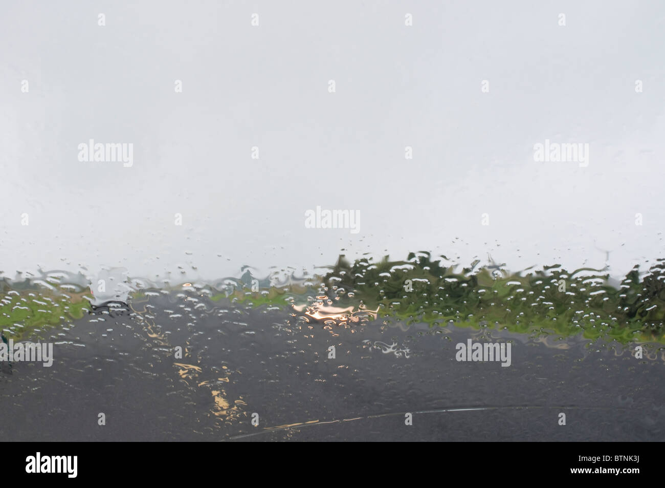 Rain covered road hi-res stock photography and images - Alamy