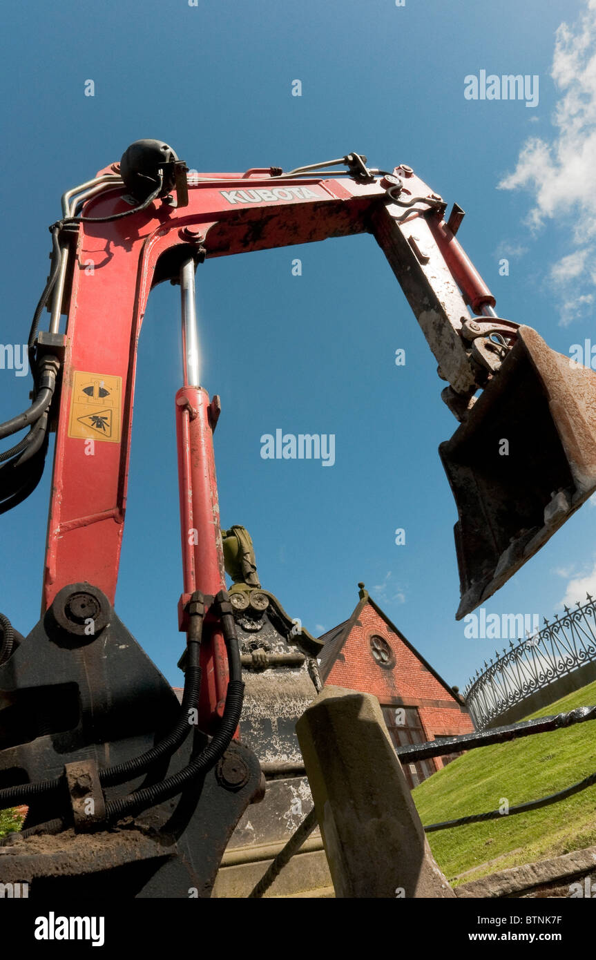 Small mobile mechanical earth digger, St Columb's Cathedral ...