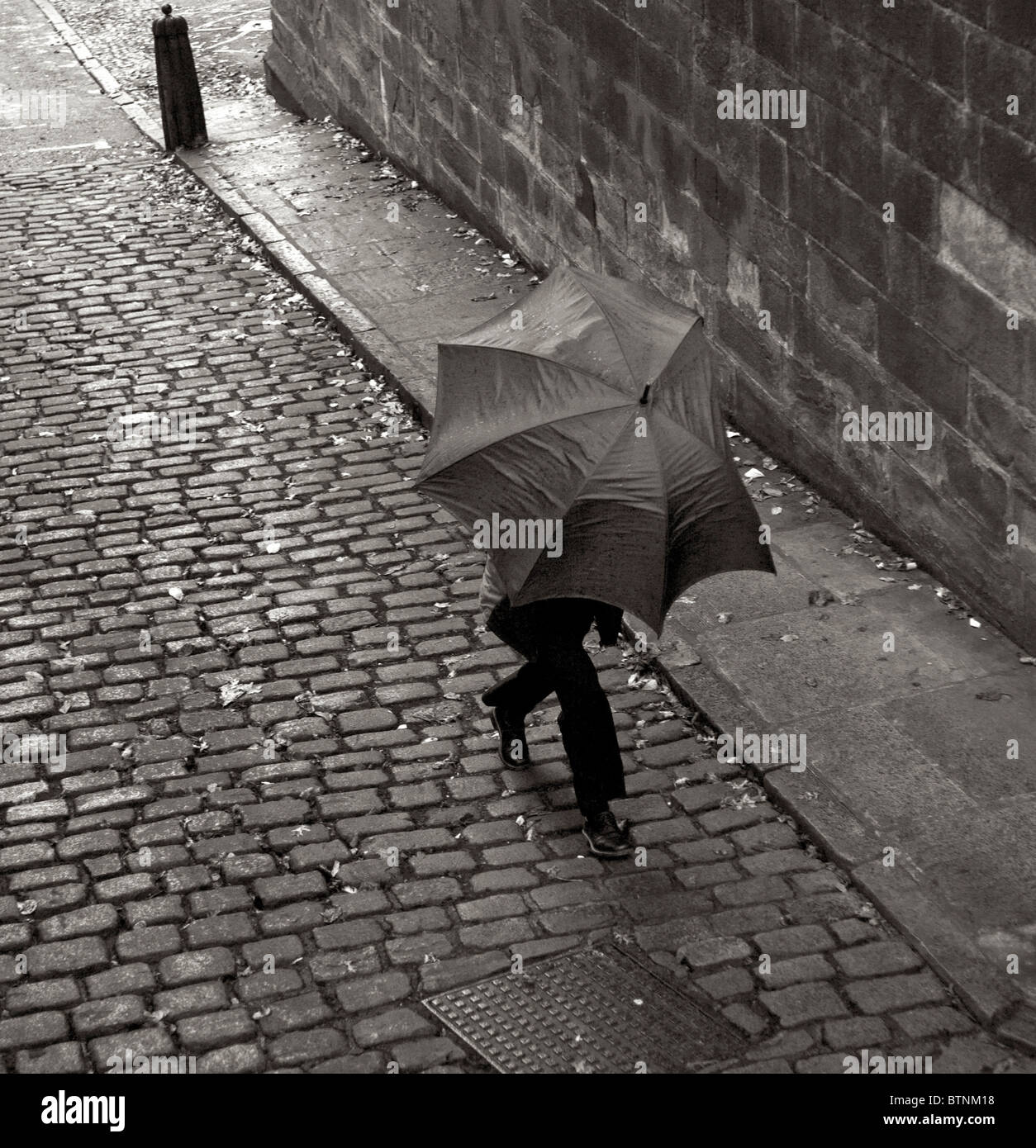 Struggling with wind hi-res stock photography and images - Alamy