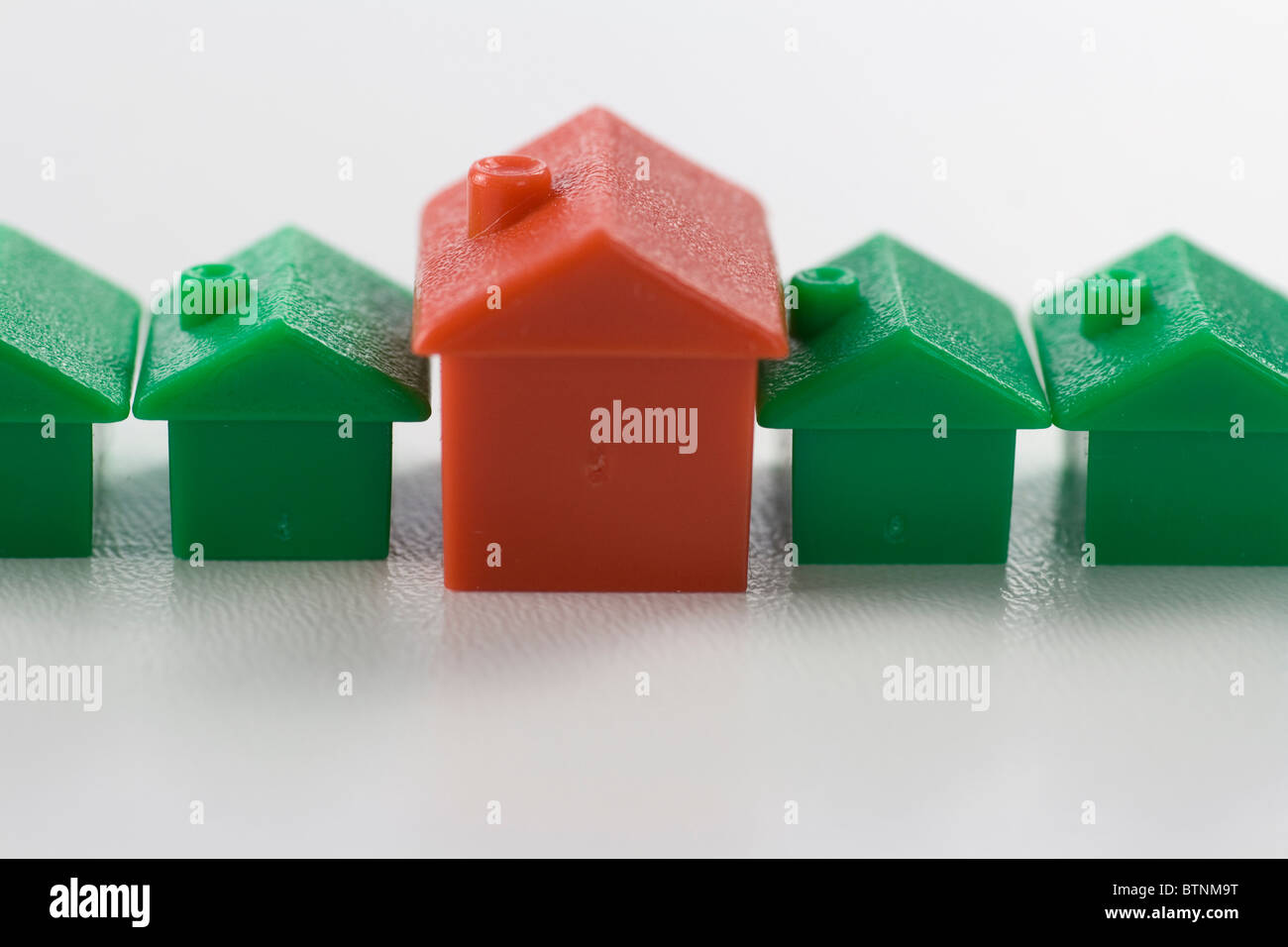 Monopoly houses in a row Stock Photo - Alamy
