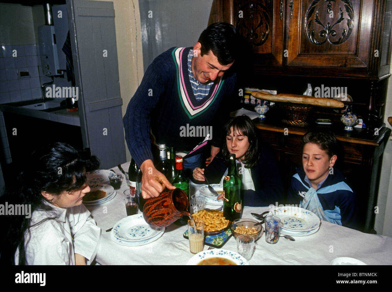 French Basque family, father, son, daughters, eating lunch, family meal ...
