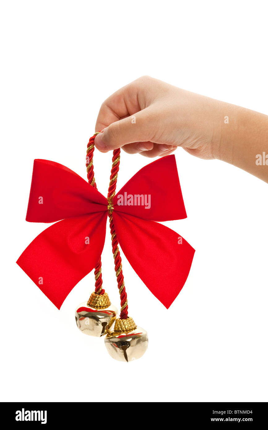 Hand bell red bow Cut Out Stock Images & Pictures - Alamy