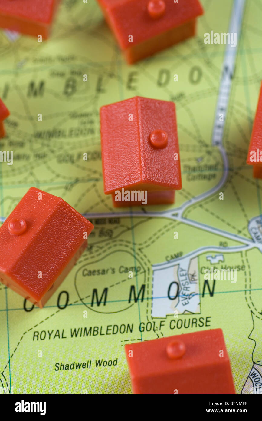 Monopoly houses on a street map Stock Photo - Alamy