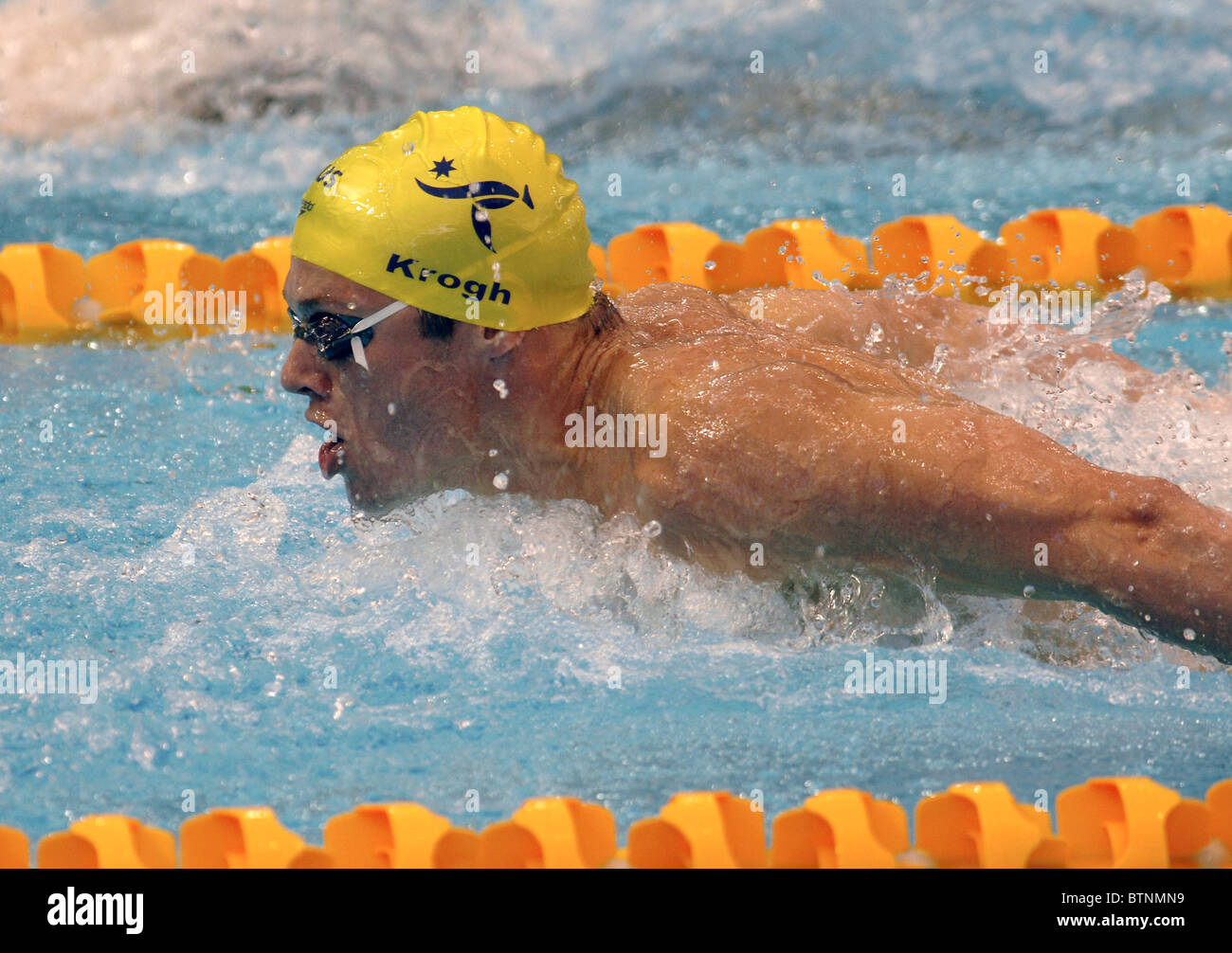 Action shot of swimmer doing butterfly stroke Stock Photo - Alamy