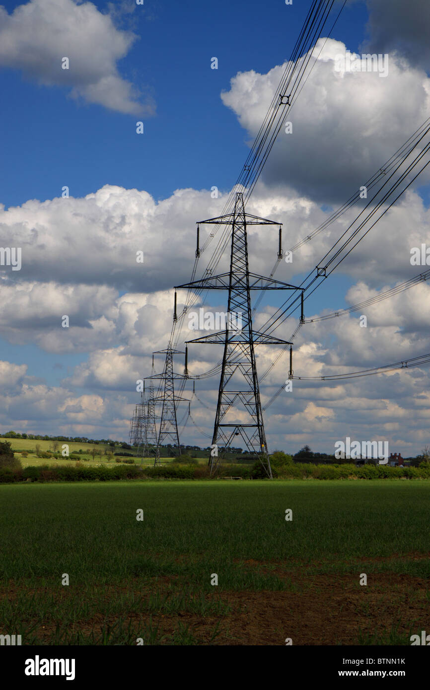Electricity pylons across the English countryside Stock Photo - Alamy