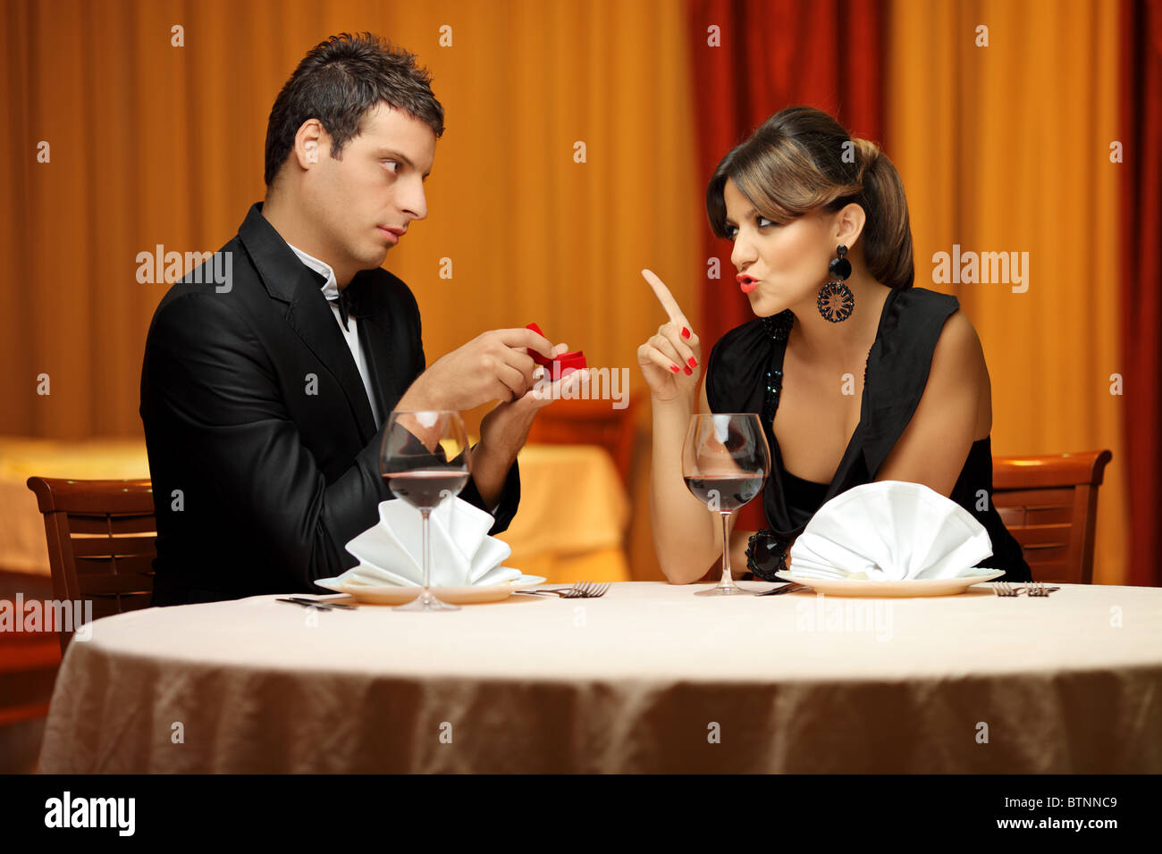 A young man making a proposal to his girlfriend Stock Photo - Alamy
