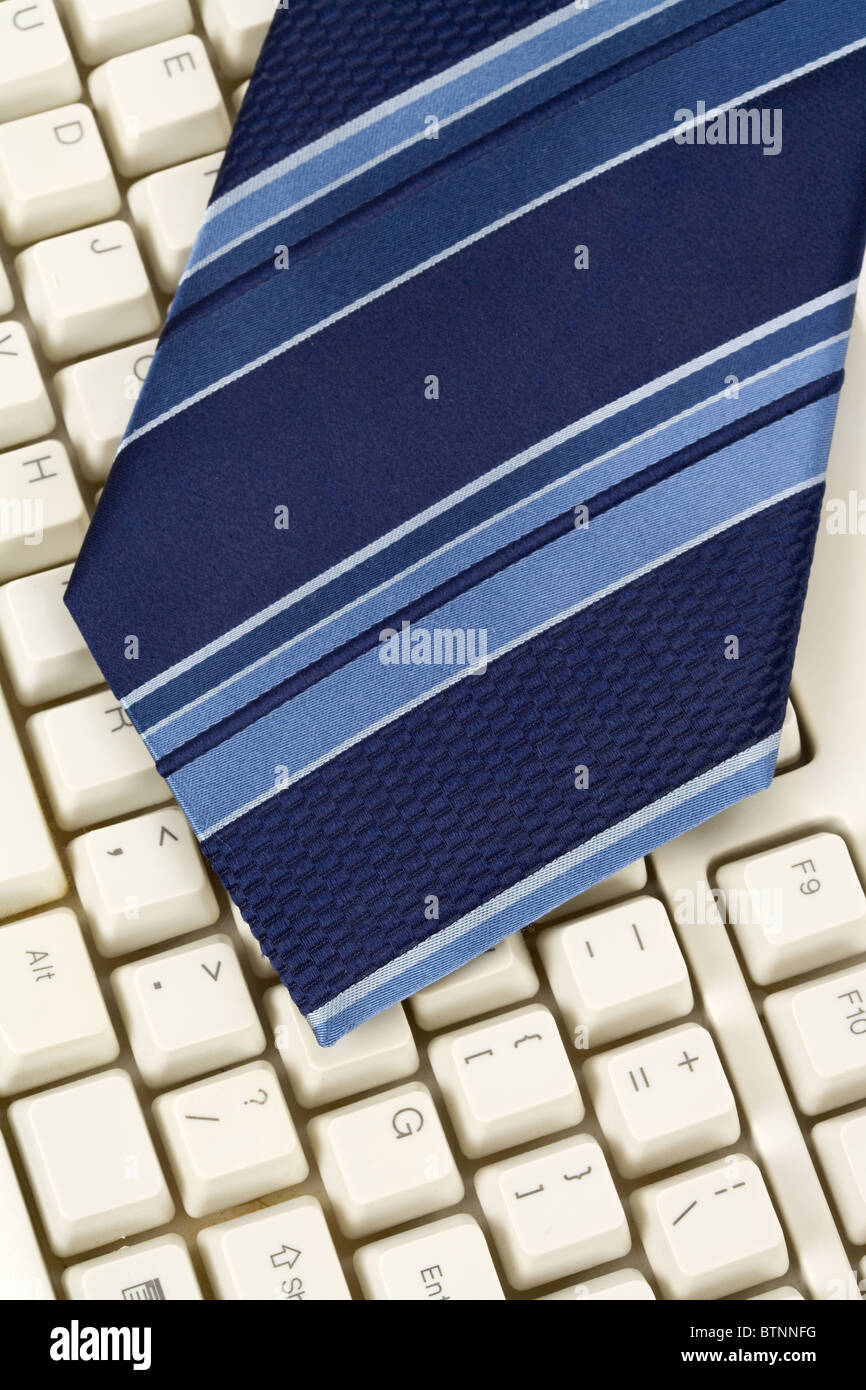 Blue Necktie and Keyboard close up shot Stock Photo - Alamy