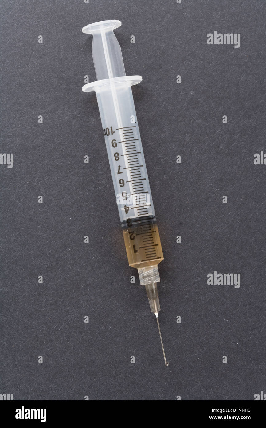 Syringe close up shot for background Stock Photo - Alamy