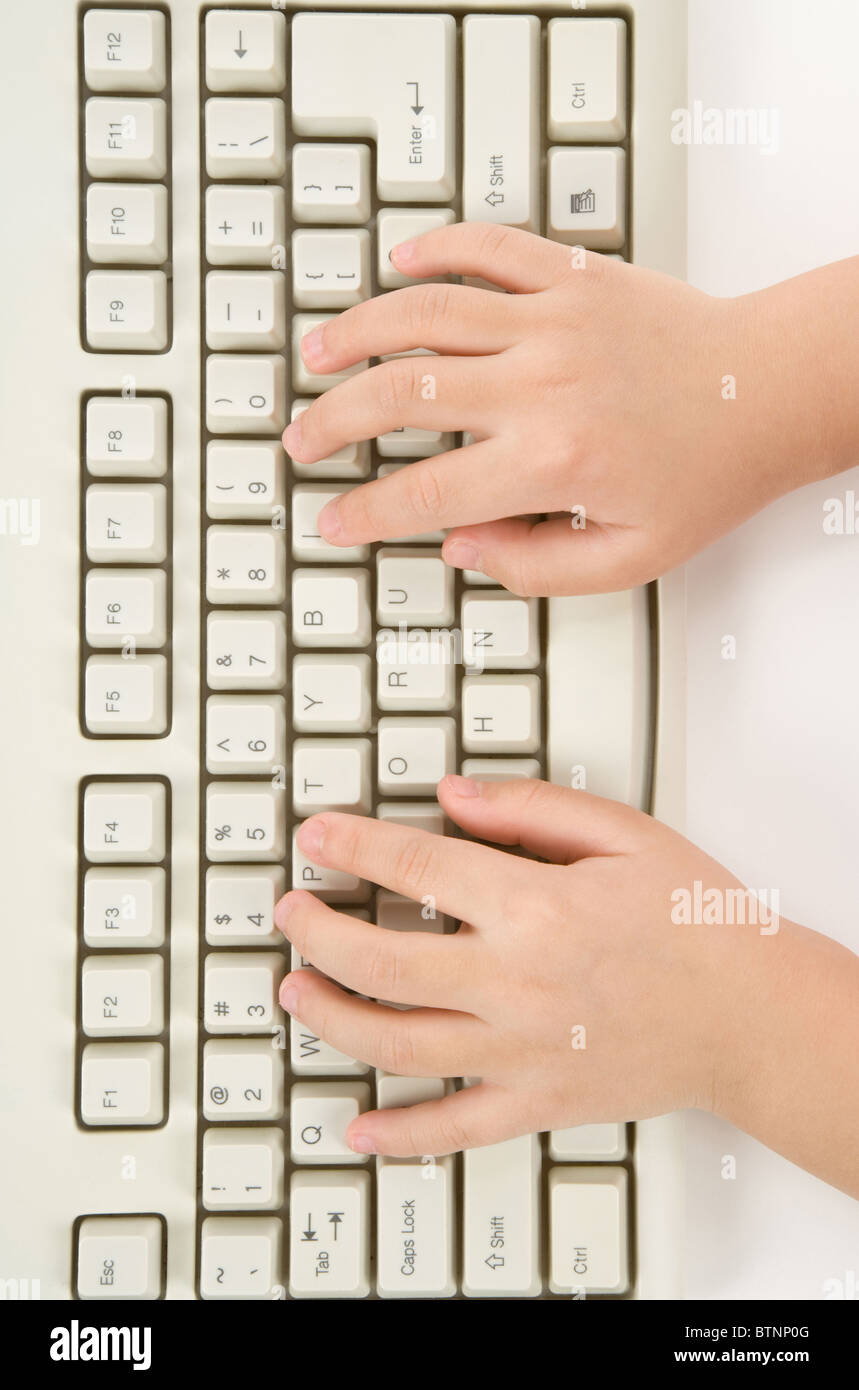 Child hand and Computer Keyboard Stock Photo - Alamy
