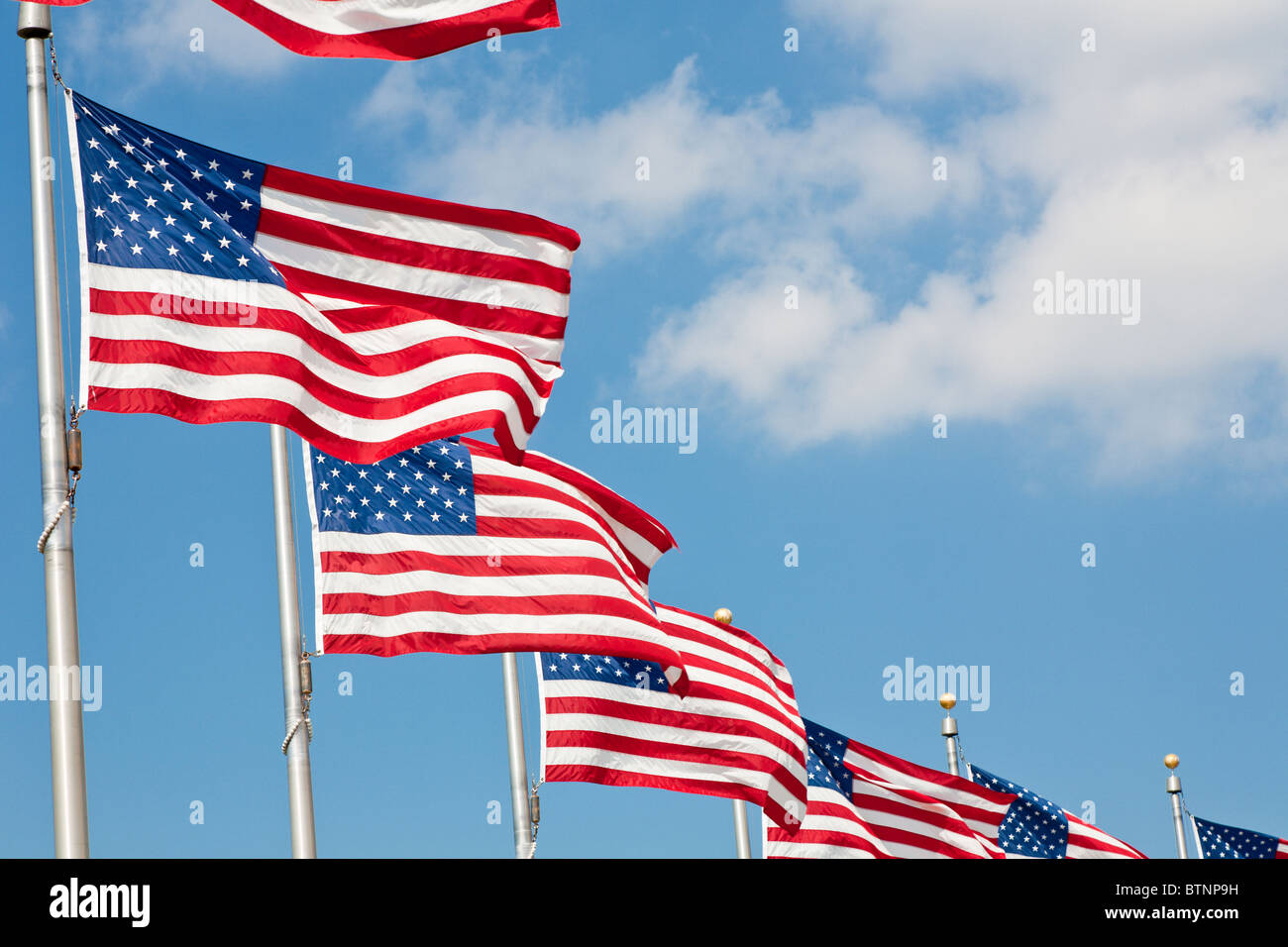 Washington DC - Sep 2009 - American flags waving in bright blue sky at ...