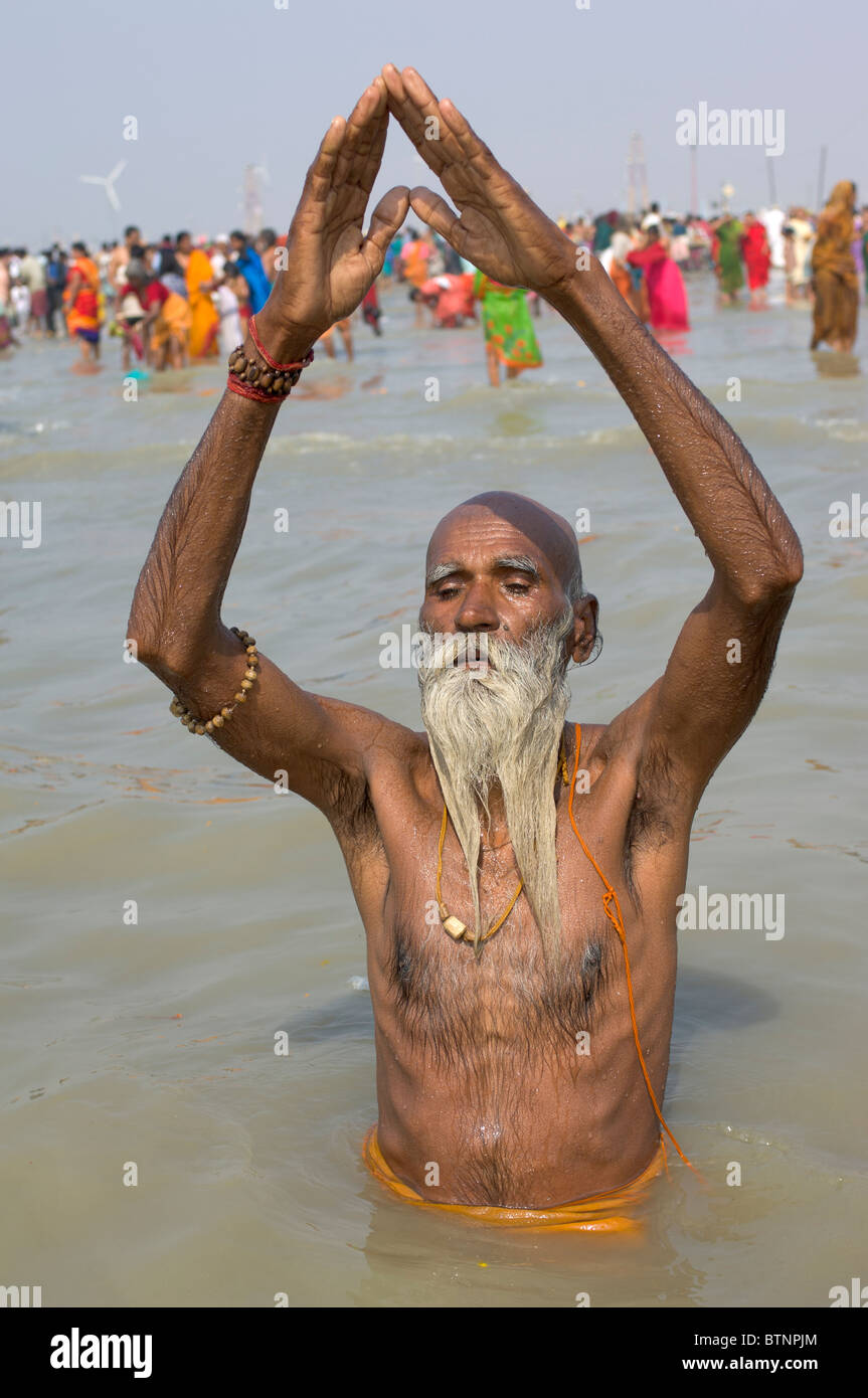 Pilgrim with long white beard and moustache praying in the Bay of ...