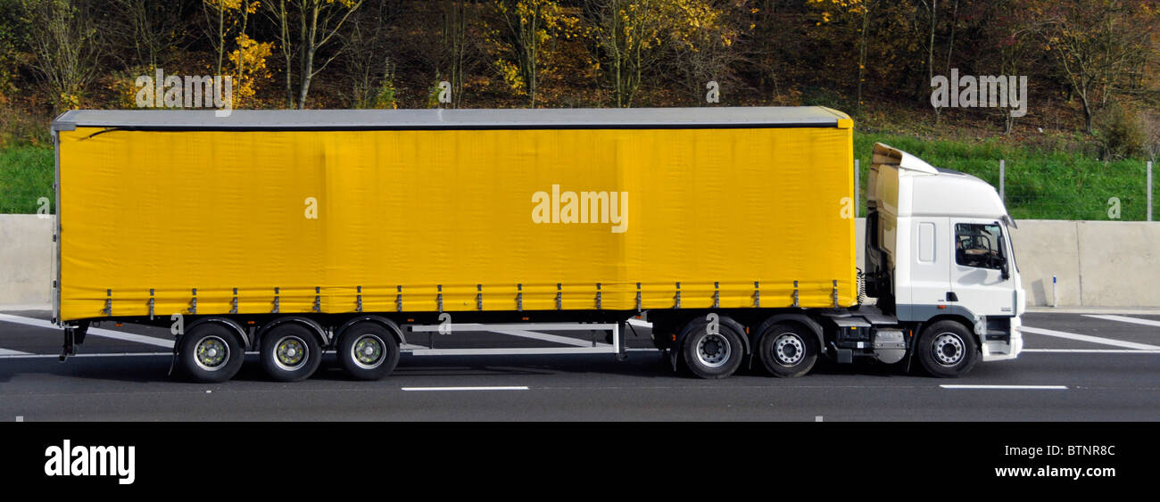Yellow hgv articulated lorries hi-res stock photography and images - Alamy